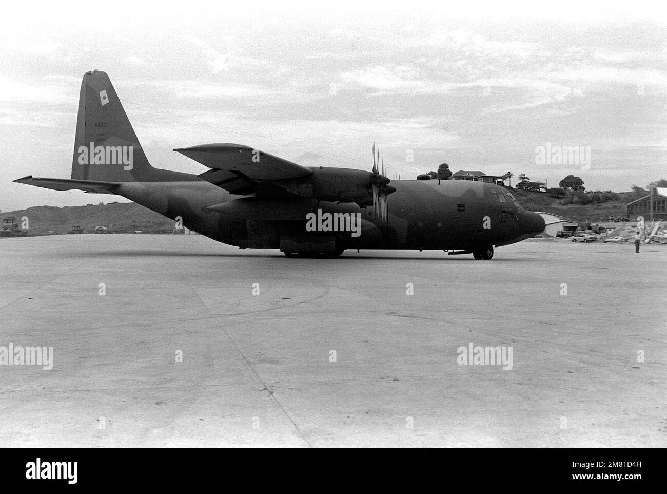 A right side view of a C-130 Hercules aircraft in use during Operation ...