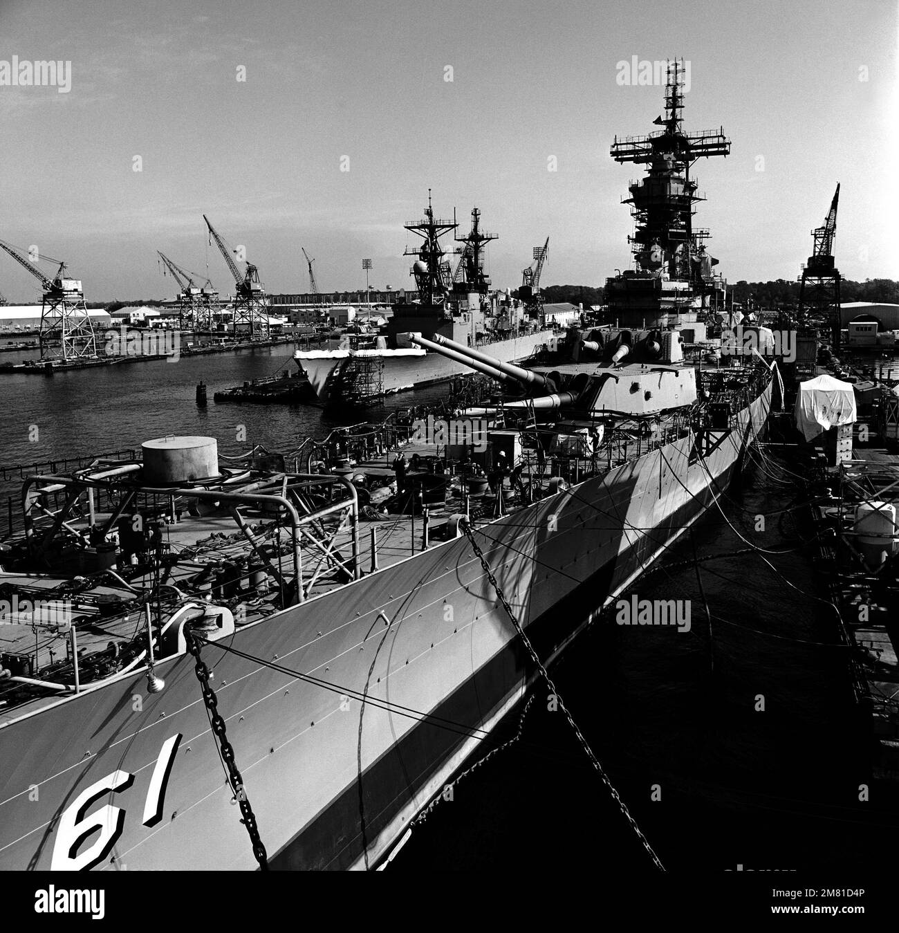 A port view of the battleship IOWA (BB 61) undergoing renovation and ...
