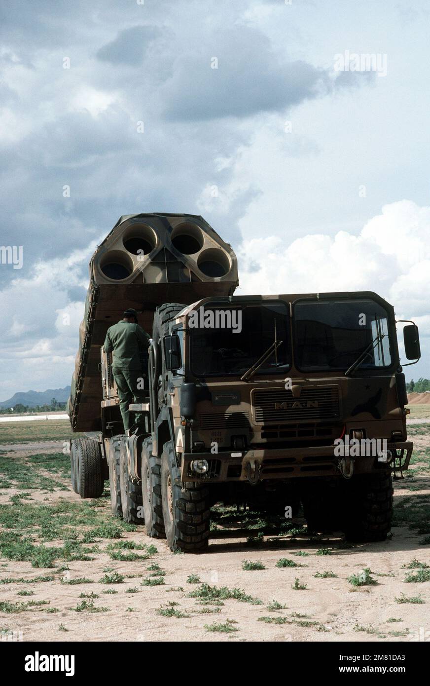 A member of the 487th Tactical Missile Wing (TMW) raises the launch ...