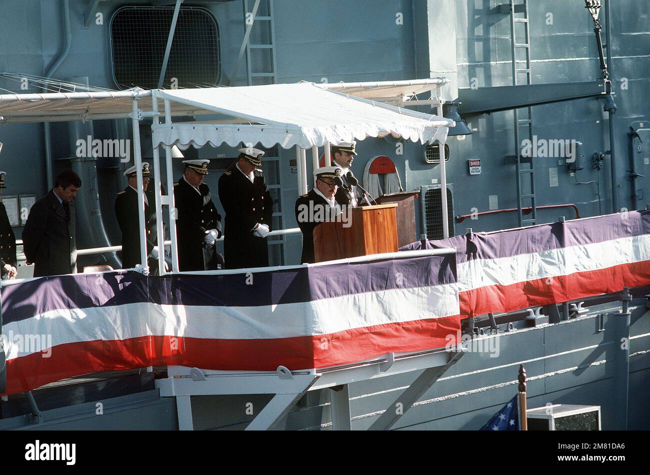 CAPT. Harry F. MacCall, chaplain, gives the invocation during the ...