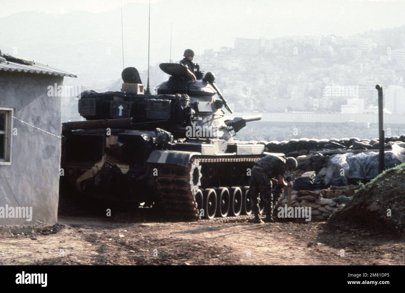 Marines position an M-60 tank in support of Checkpoint 76 during a ...