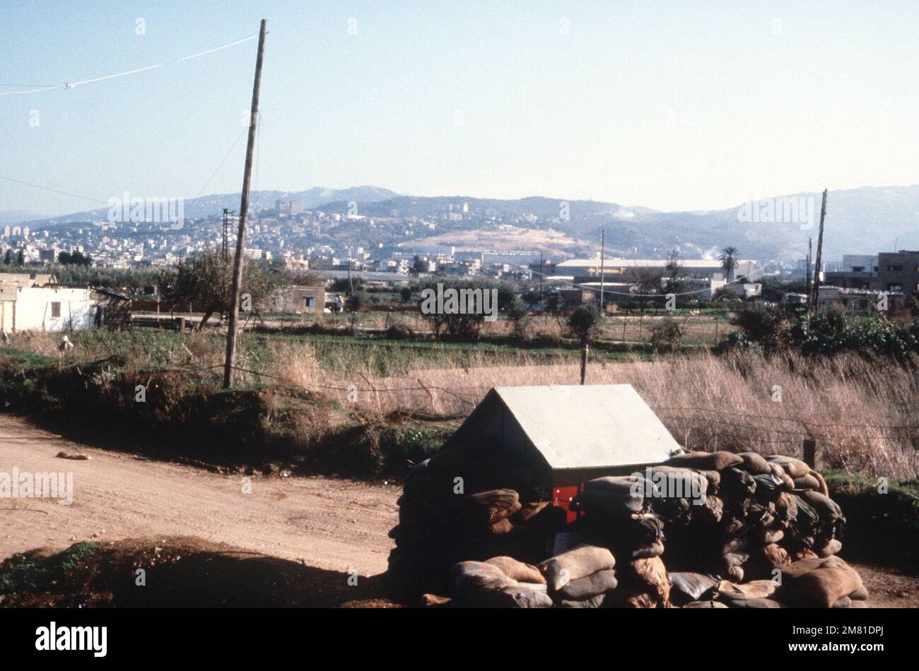 A view from Checkpoint 76 as Marines observe the surrounding area ...