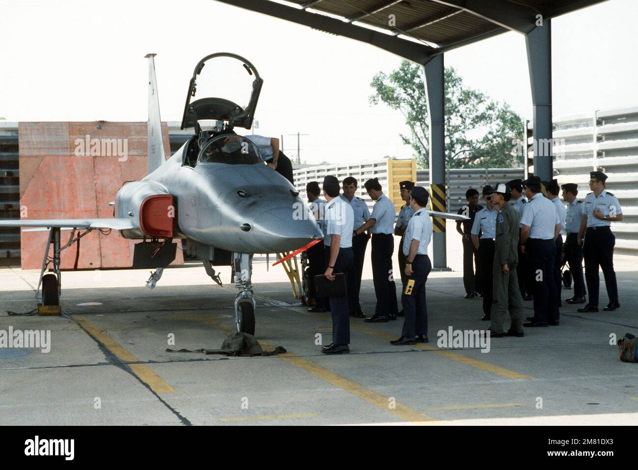 Air crews of the 3rd Tactical Fighter Squadron inspect a Royal Thai Air ...