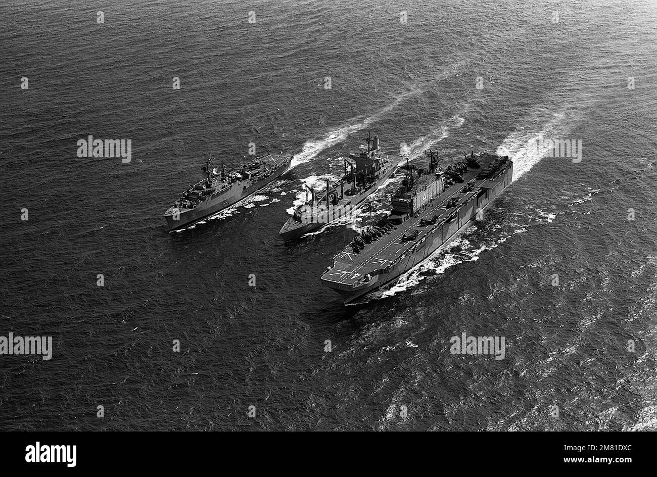 An aerial bow view of the fleet oiler USS PLATTE (AO-186), center ...