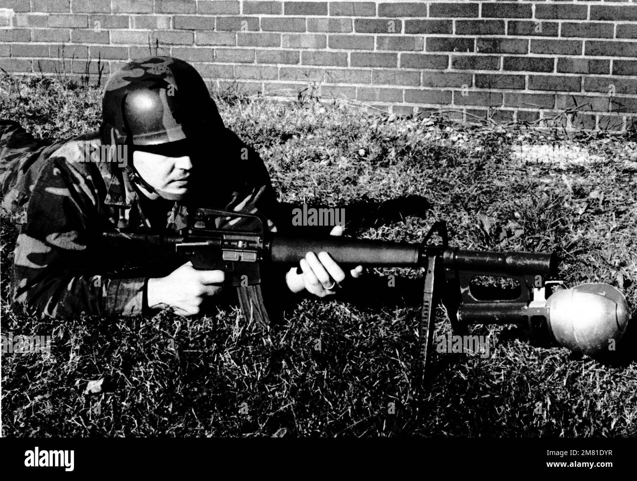 A Marine prepares to launch a Rifleman's Assault Weapon (RAW) attached ...