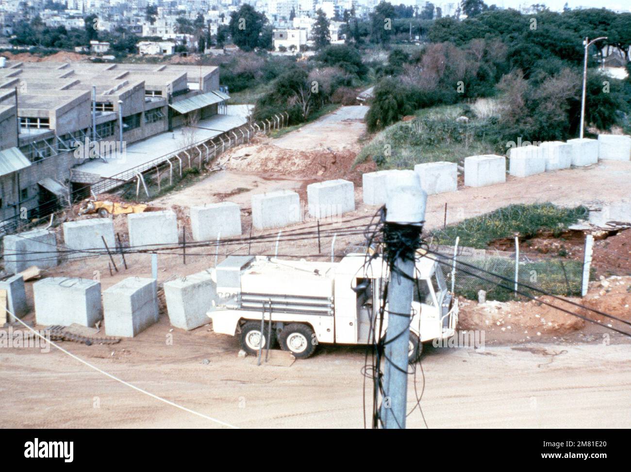 Cement blocks called "Dragon's Teeth," are used to cordon off an area ...
