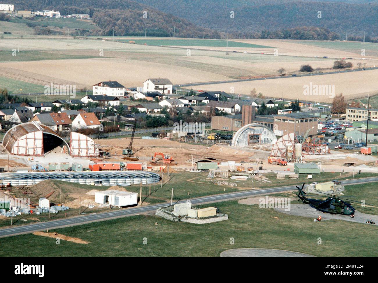 An aerial view of aircraft hangars under construction near the flight ...