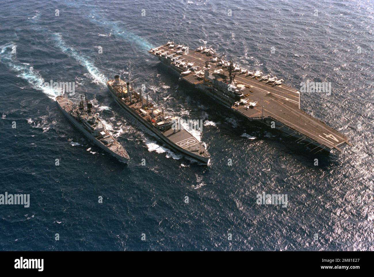 A starboard bow view of the oiler USNS NAVASOTA (T-AO 106) conducting ...