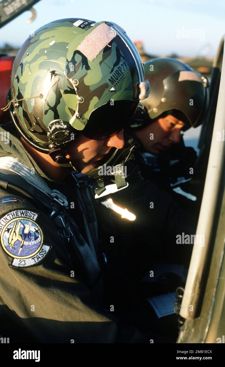 The pilot and co-pilot from the 23rd Tactical Air Support Squadron sit ...