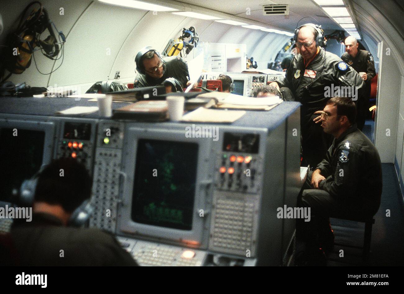 Operations take place inside an E-3A Sentry Airborne Warning and ...