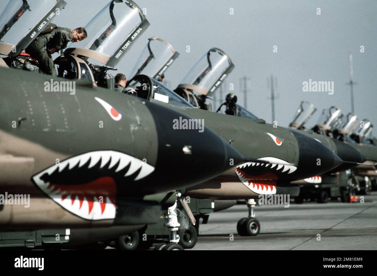 F-4 Phantom II aircraft are prepared for takeoff during a tactical ...