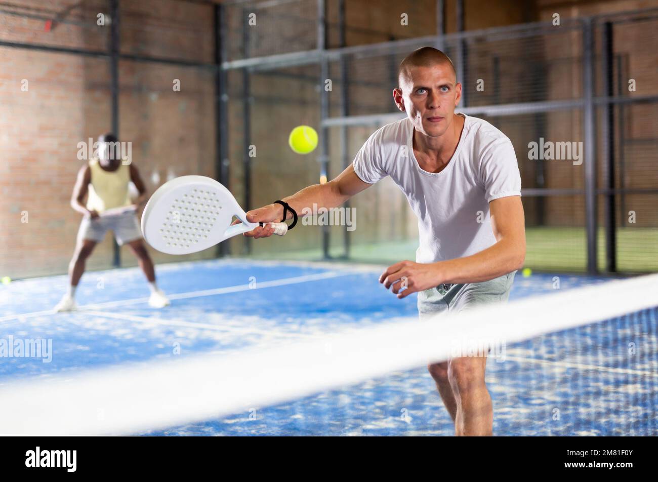 Sporty man padel tennis hi-res stock photography and images - Alamy