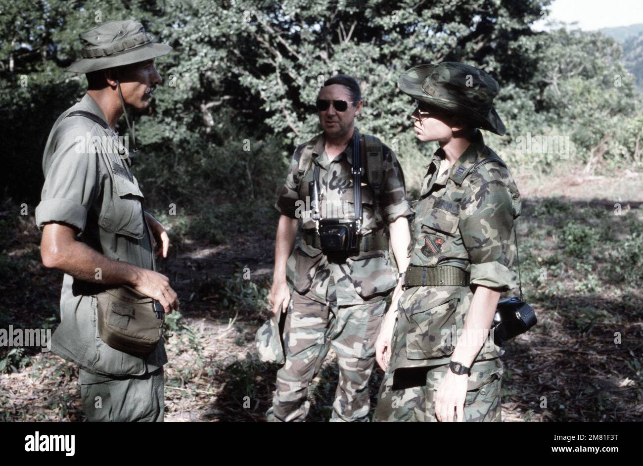 Colonel James Arthur and Captain Peter Vandyck talk with Navy doctor ...