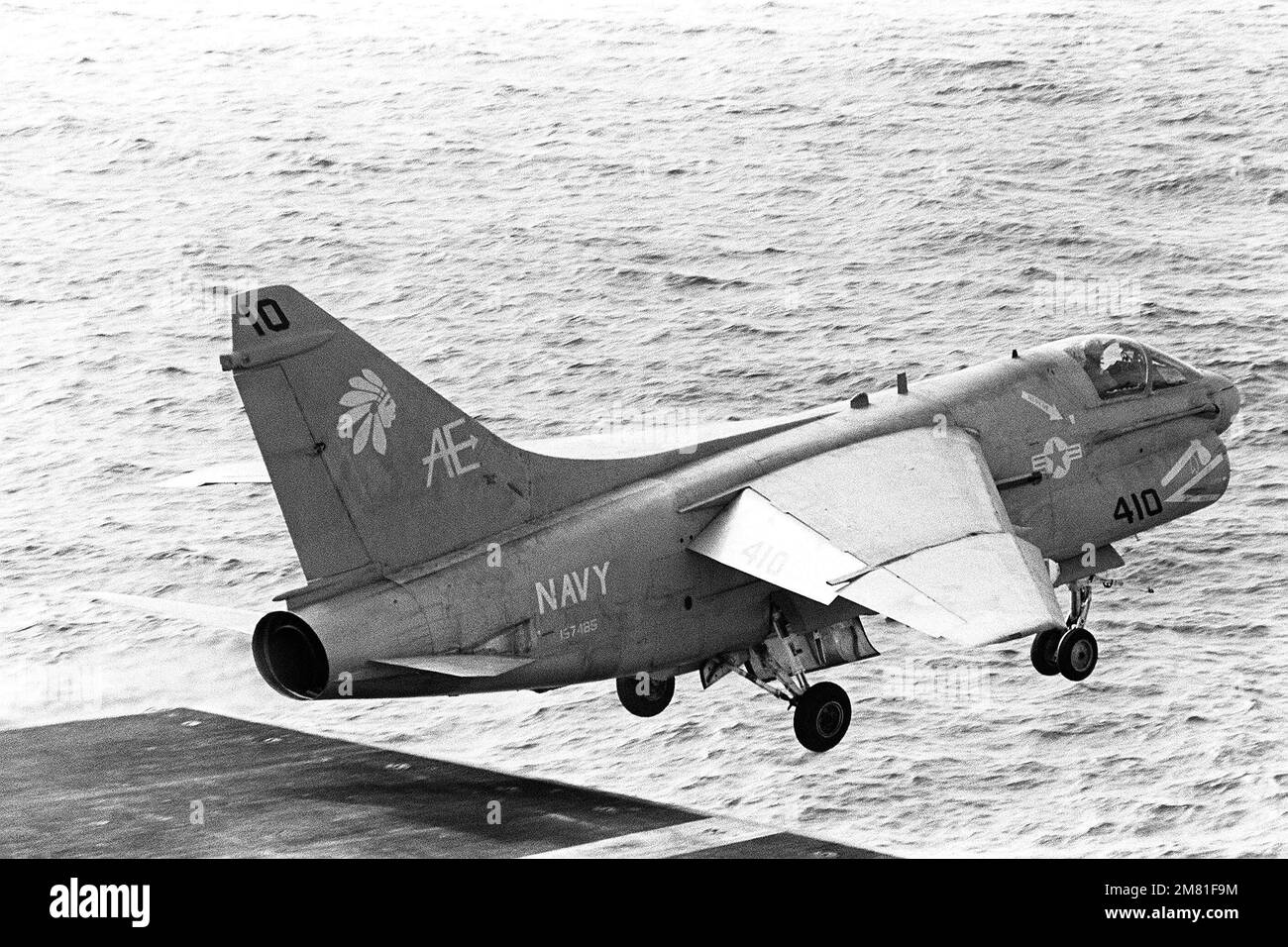 An A-7E Corsair II aircraft takes off from the flight deck of the ...