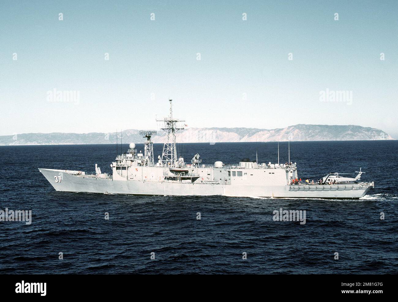 A port beam view of the guided missile frigate USS CROMMELIN (FFG-37 ...