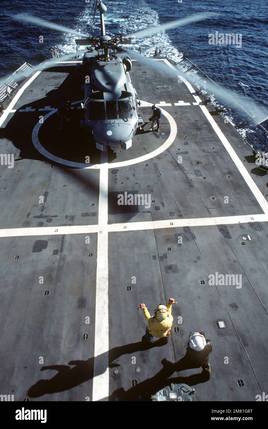 Crewmen secure the Navy's first operational Mark III LAMPS (Light ...