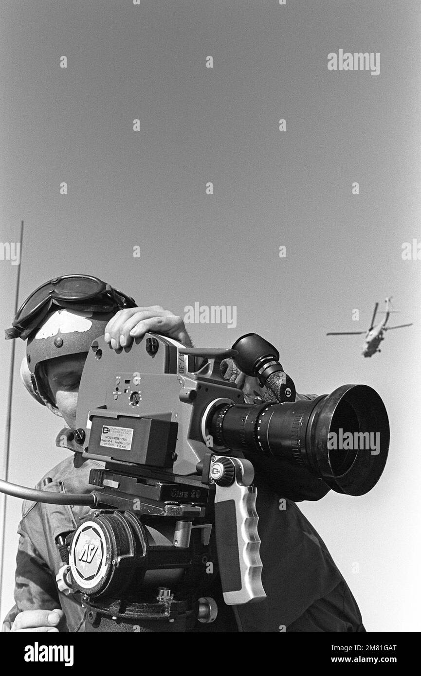 A cameramen films the flight deck landing qualifications for the Navy's first operational Mark ...