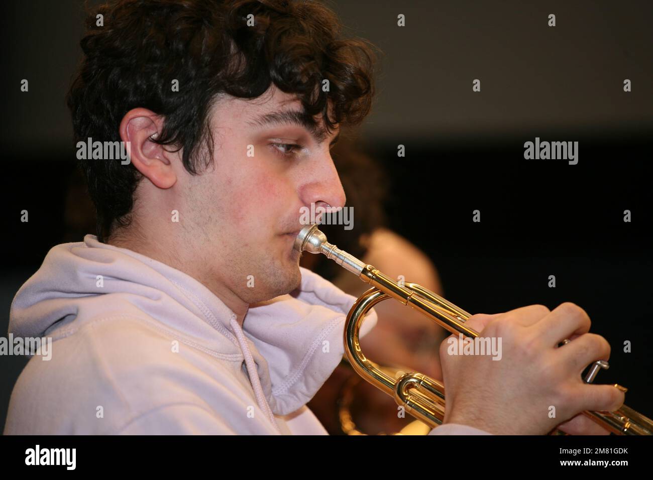 Young student trumpeter playing a rehearsal piece with the CoMA ...