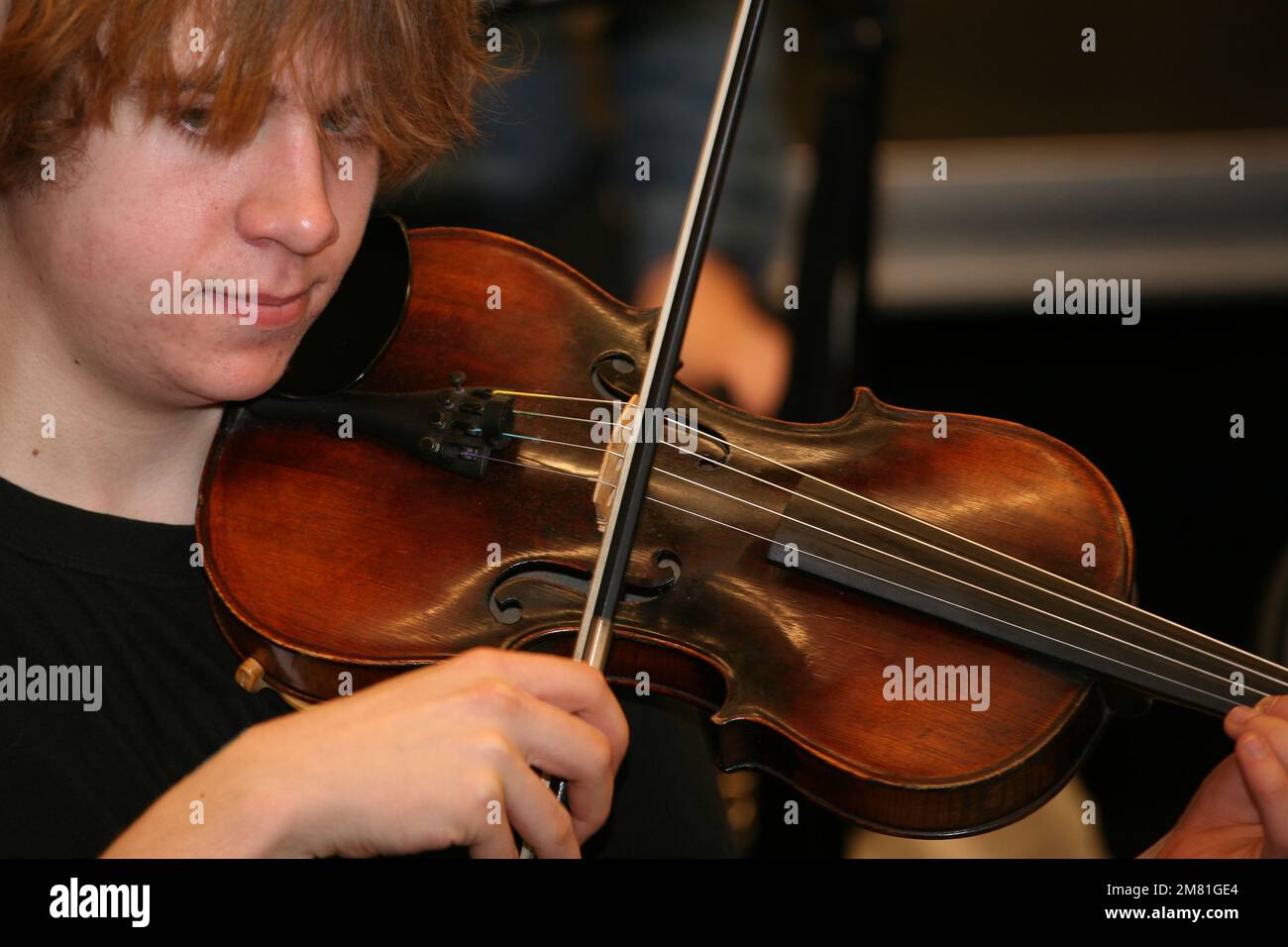 Young student violinist playing with the COMA (Contemporary Music for ...