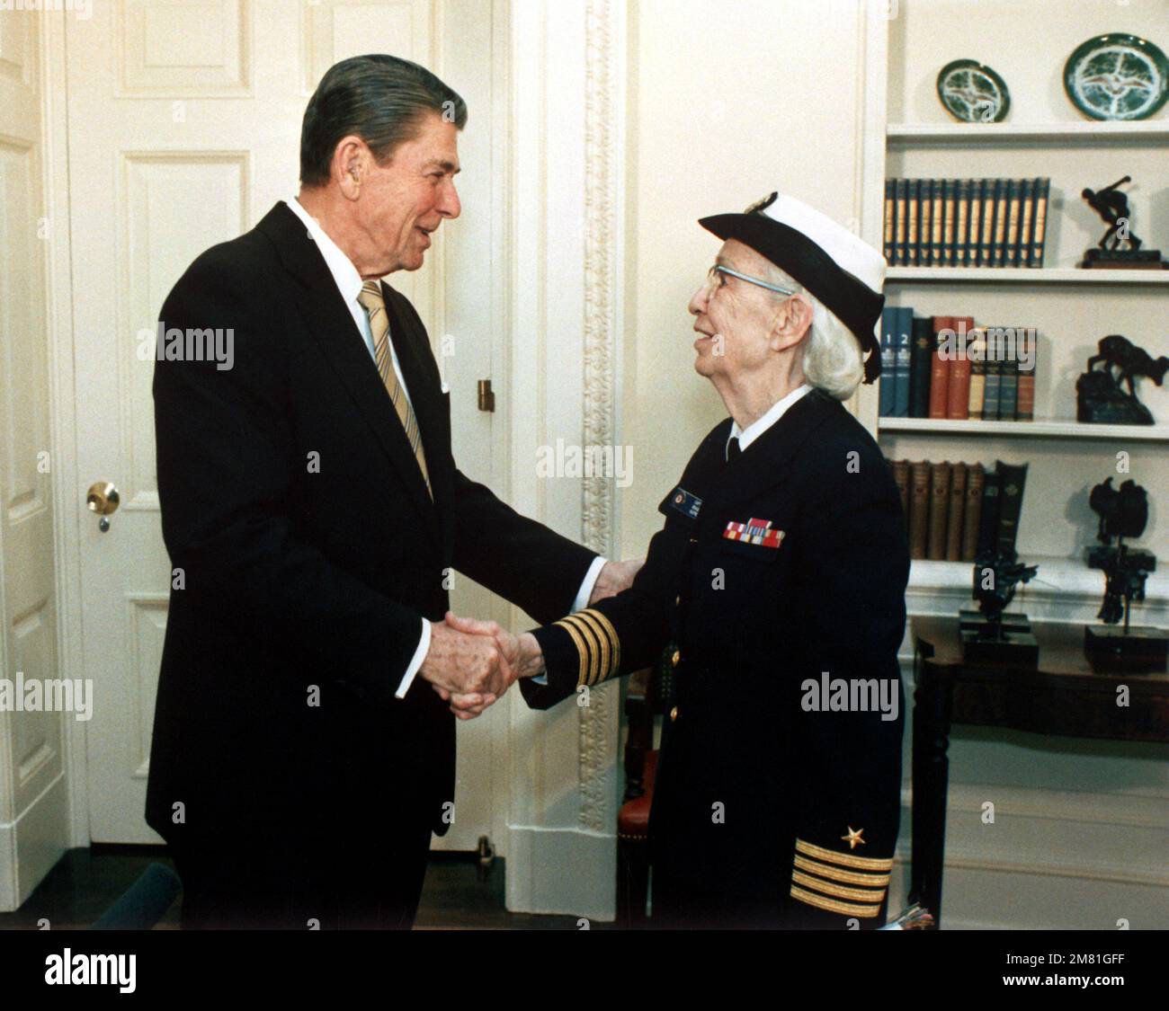 President Ronald Reagan greets CAPT. Grace Hopper as she arrives at the ...