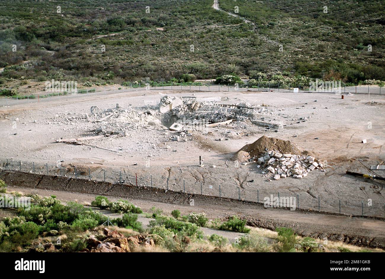 An aerial view of a Titan II missile silo after being destroyed by ...