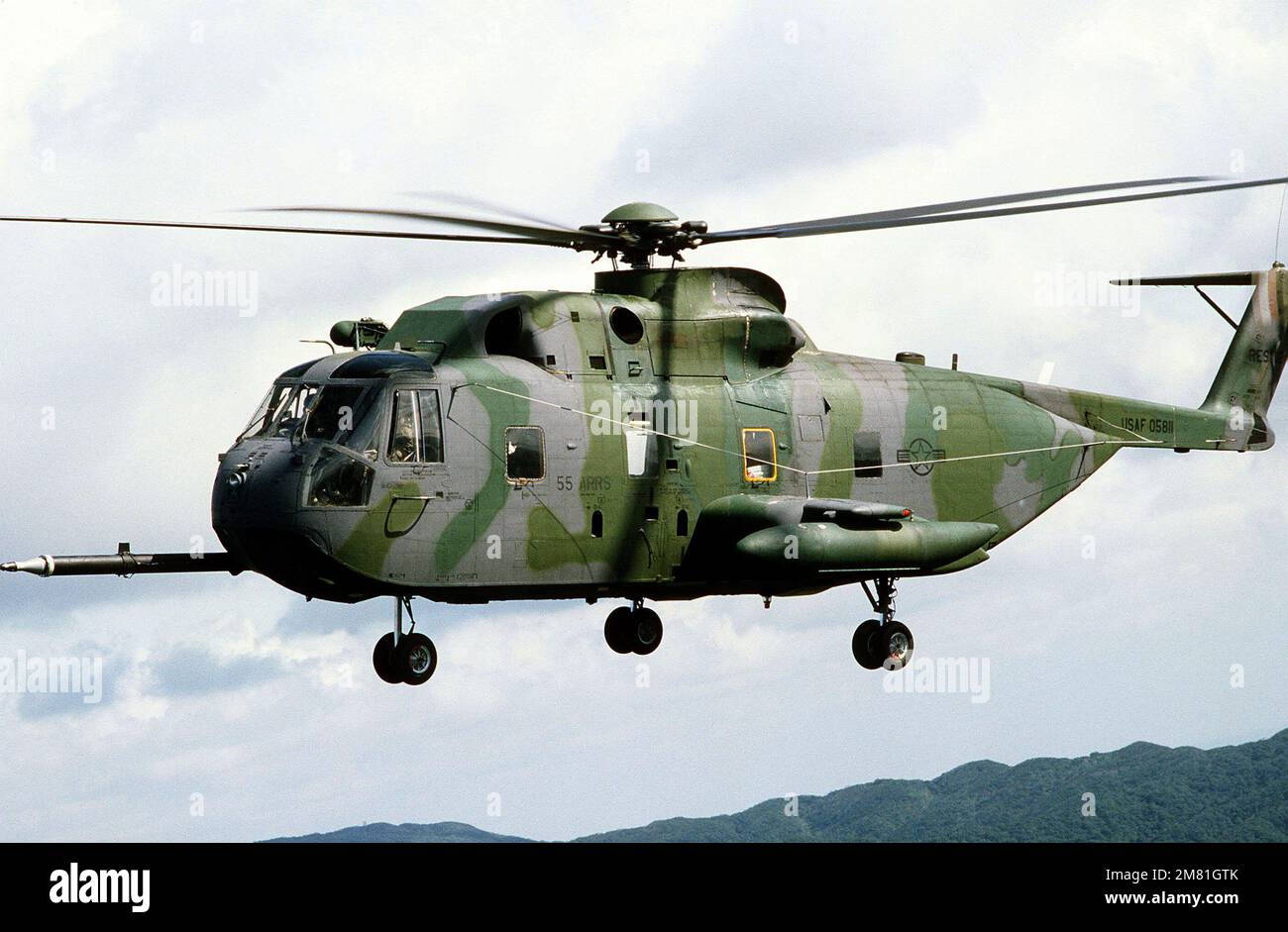 An air-to-air left side view of a CH-3 Jolly Green Giant helicopter ...