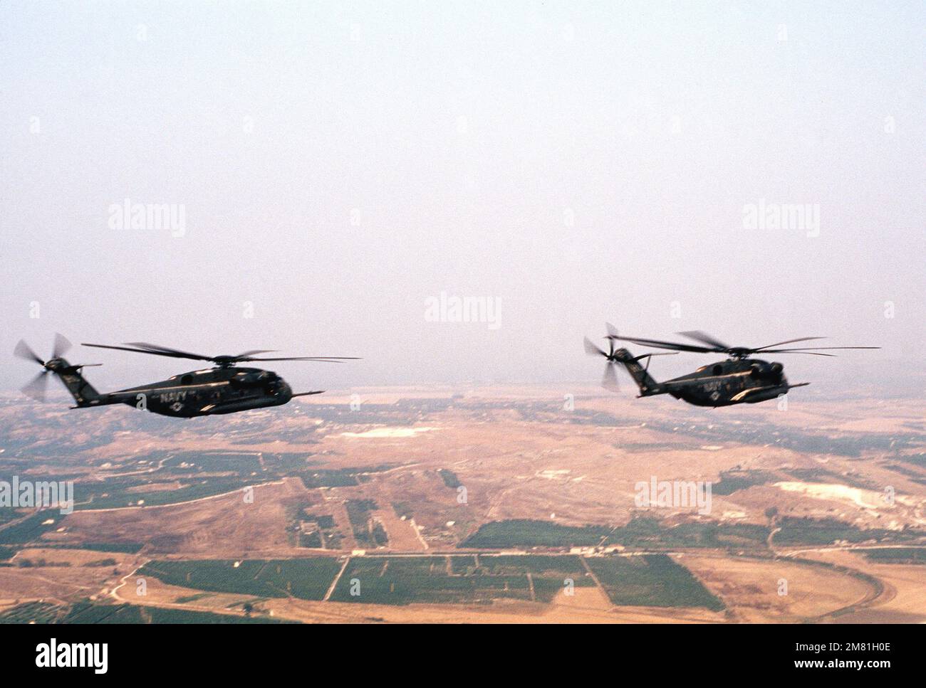 Two CH-53E Super Stallion helicopters from Helicopter Combat Support ...