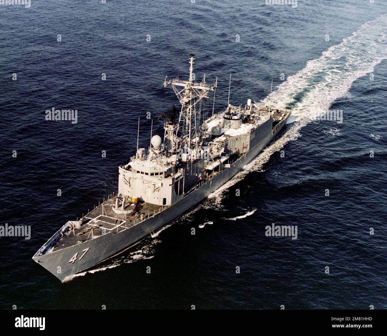 An elevated port bow view of the guided missile frigate NICHOLAS (FFG ...