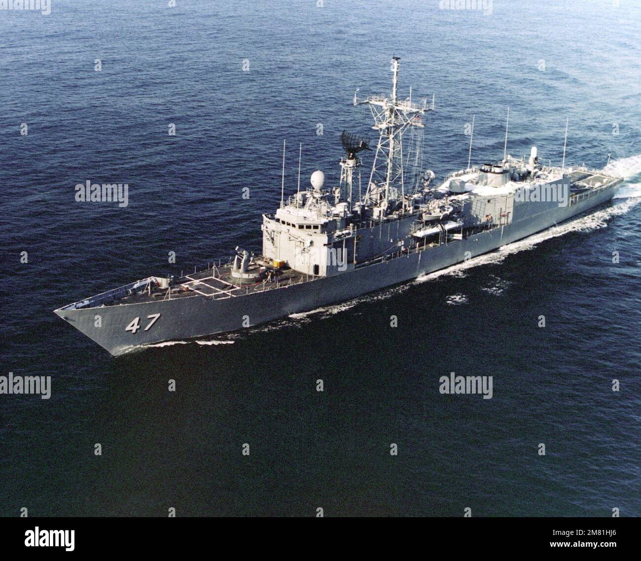 An elevated port bow view of the guided missile frigate NICHOLAS (FFG-47) underway during sea ...