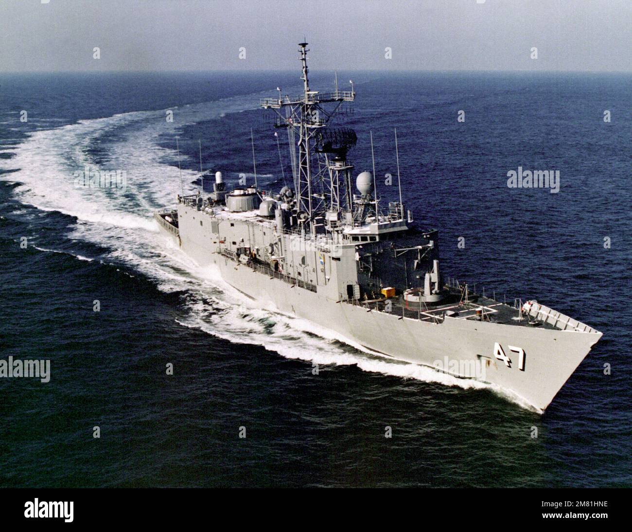 An elevated starboard view of the guided missile frigate NICHOLAS (FFG-47) underway during sea ...