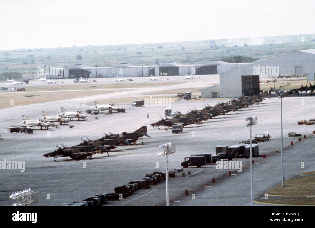 F-4 Phantom II aircraft parked on the flight line during a tactical ...