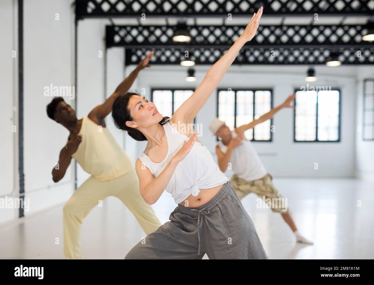 Dancers training modern dance movements Stock Photo - Alamy