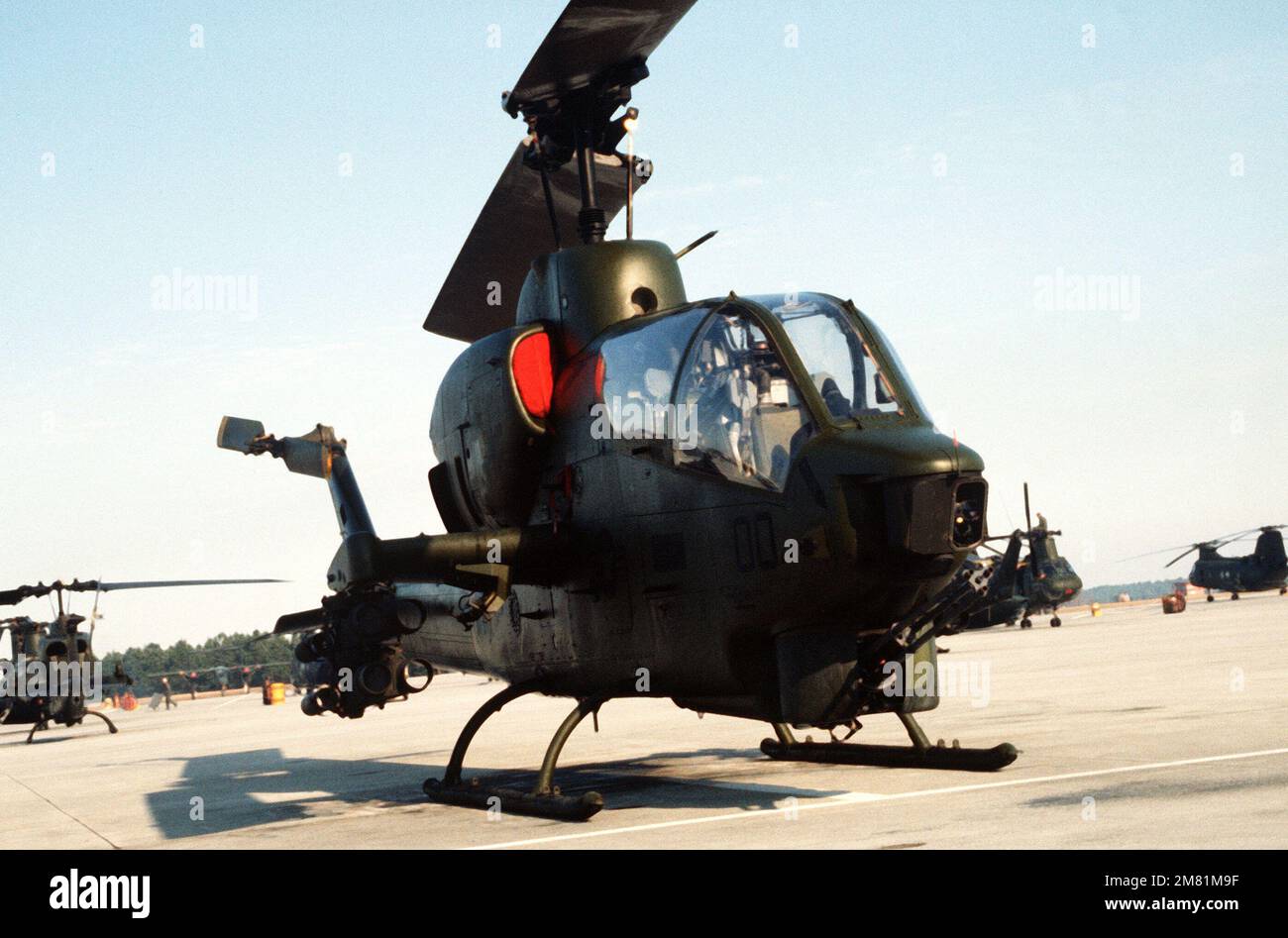 A right front view of an AH-1T Sea Cobra helicopter from the Marine ...