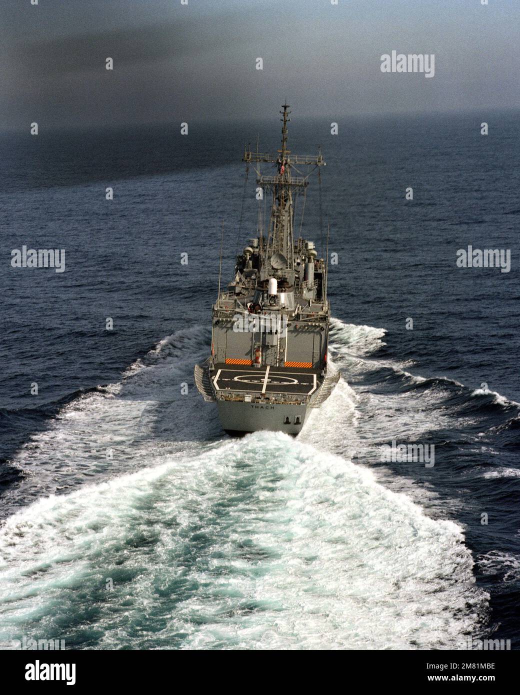 An aerial stern view of the guided missile frigate THACH (FFG 43 ...