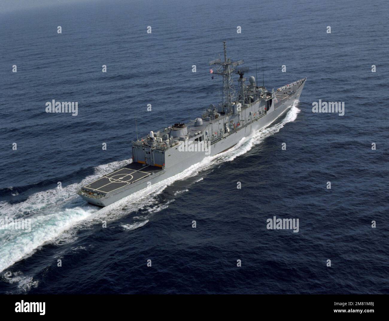 An aerial starboard quarter view of the guided missile frigate THACH ...