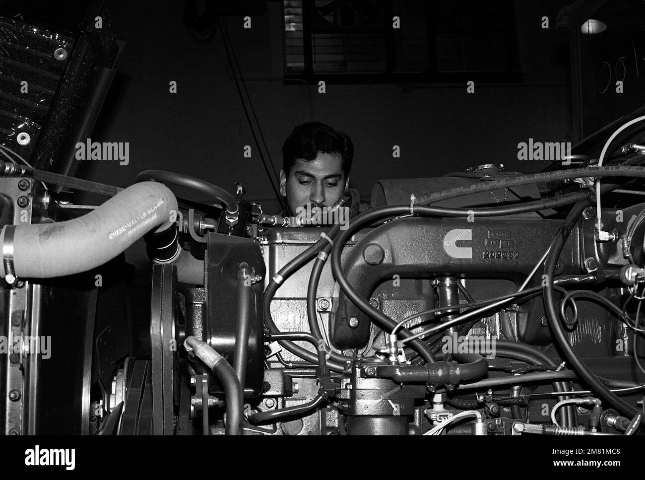 A 2nd Light Anti-Aircraft Missile Battalion mechanic inspects a ...