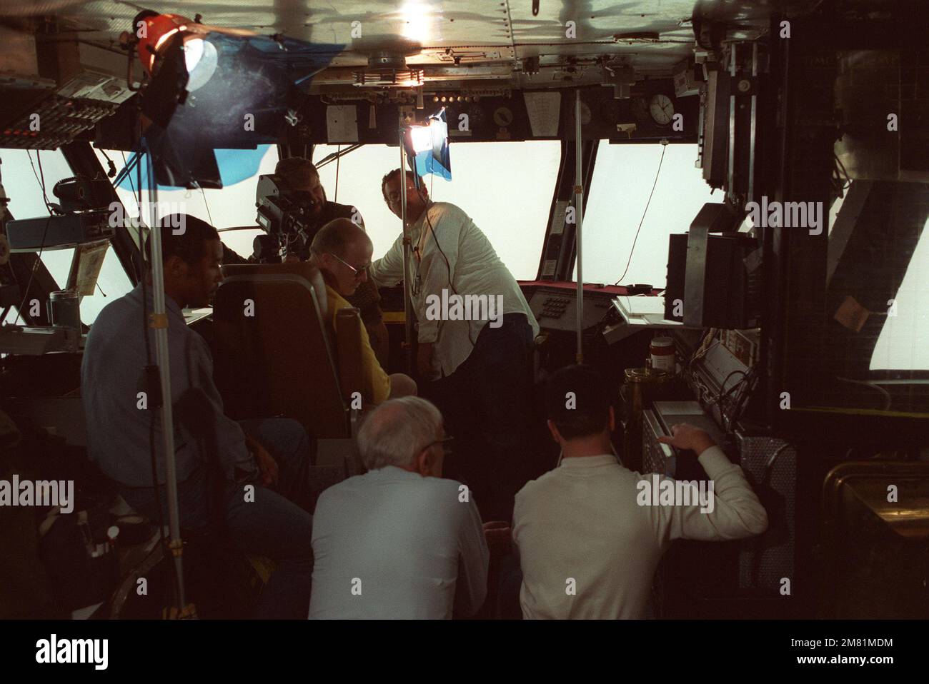 An audiovisual crew in the control tower of the aircraft carrier USS ...