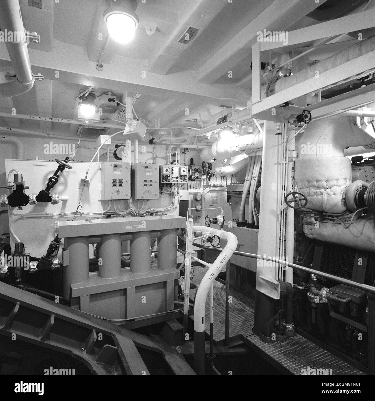 An interior view of auxiliary machine room No. 1 on the guided missile ...