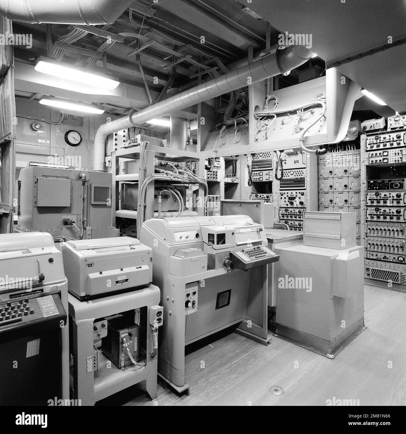 An interior view of the communications center on the guided missile ...