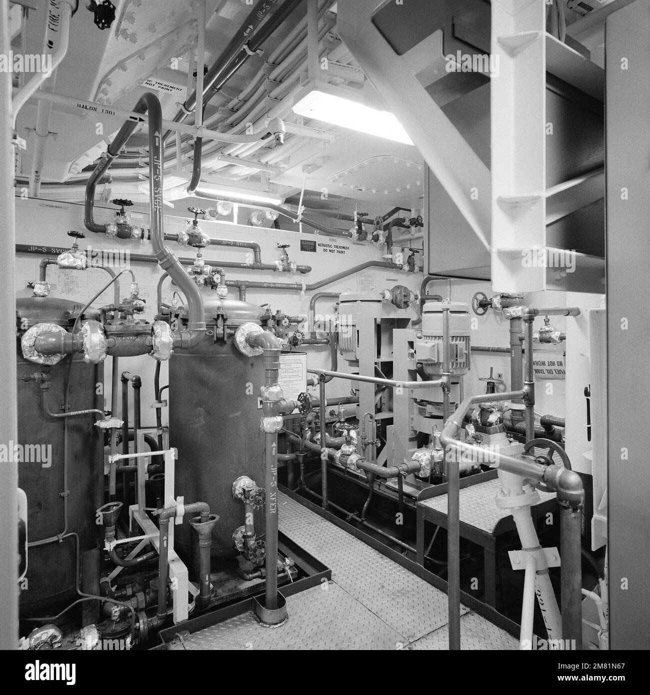 An interior view of auxiliary machine room No. 3 on the guided missile ...