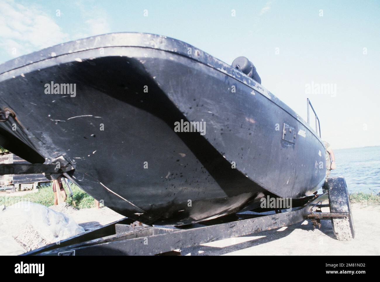 An 18-foot utility boat of a US Navy Combat Boat Unit from Panama is ...