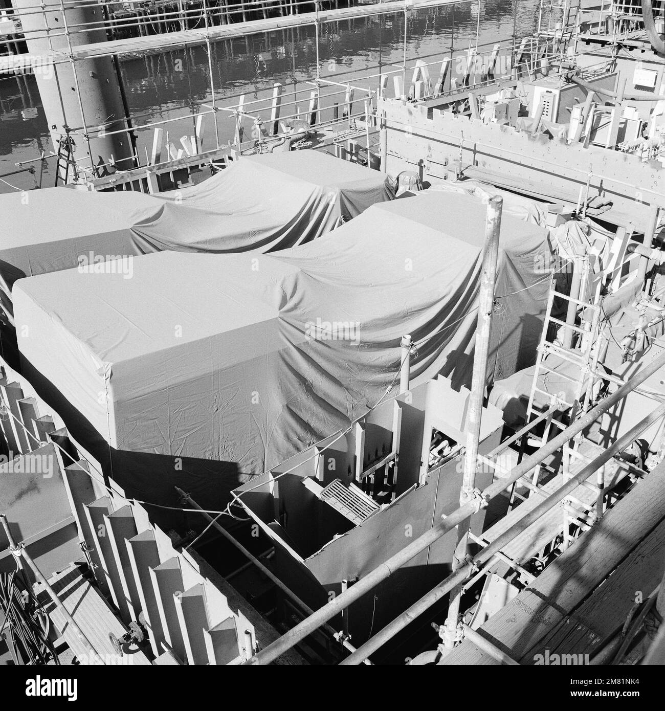 An interior view of the main engine room on the guided missile frigate ...