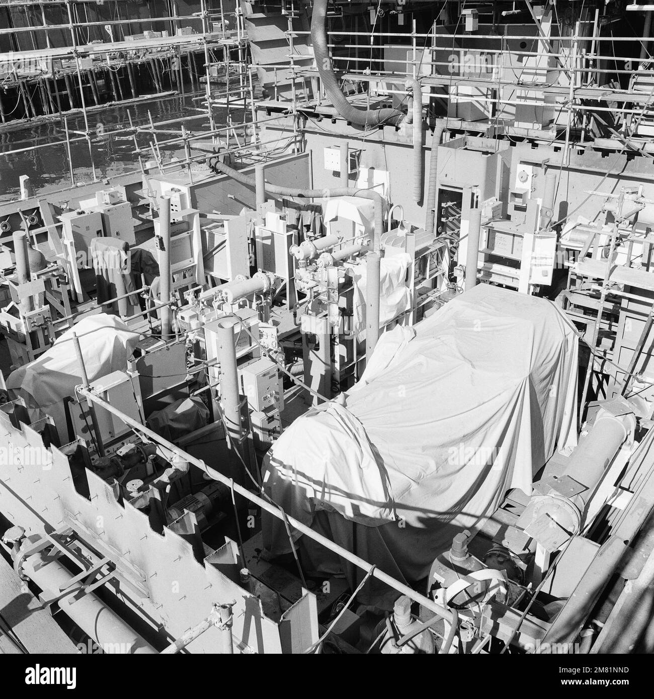 An interior view of auxiliary machine room No. 3 on the guided missile ...