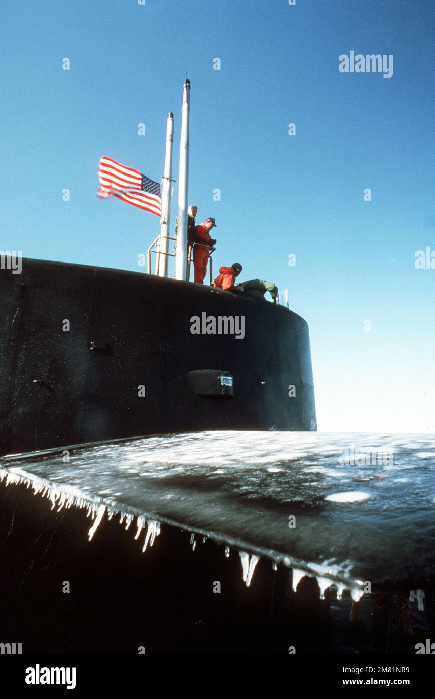 Ice covers the diving planes of the nuclear-powered fleet ballistic ...