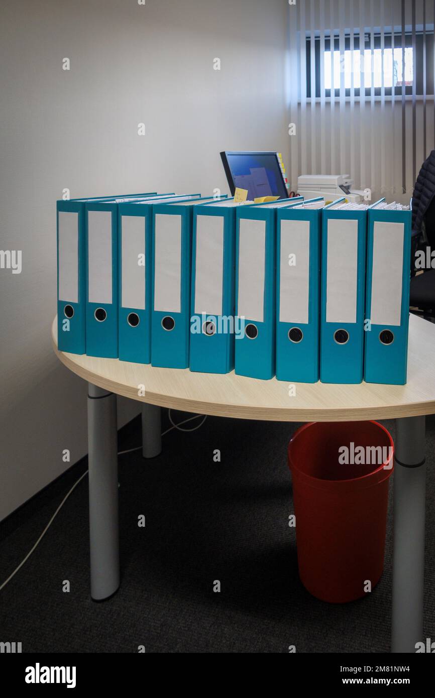 Many folders on table hi-res stock photography and images - Alamy