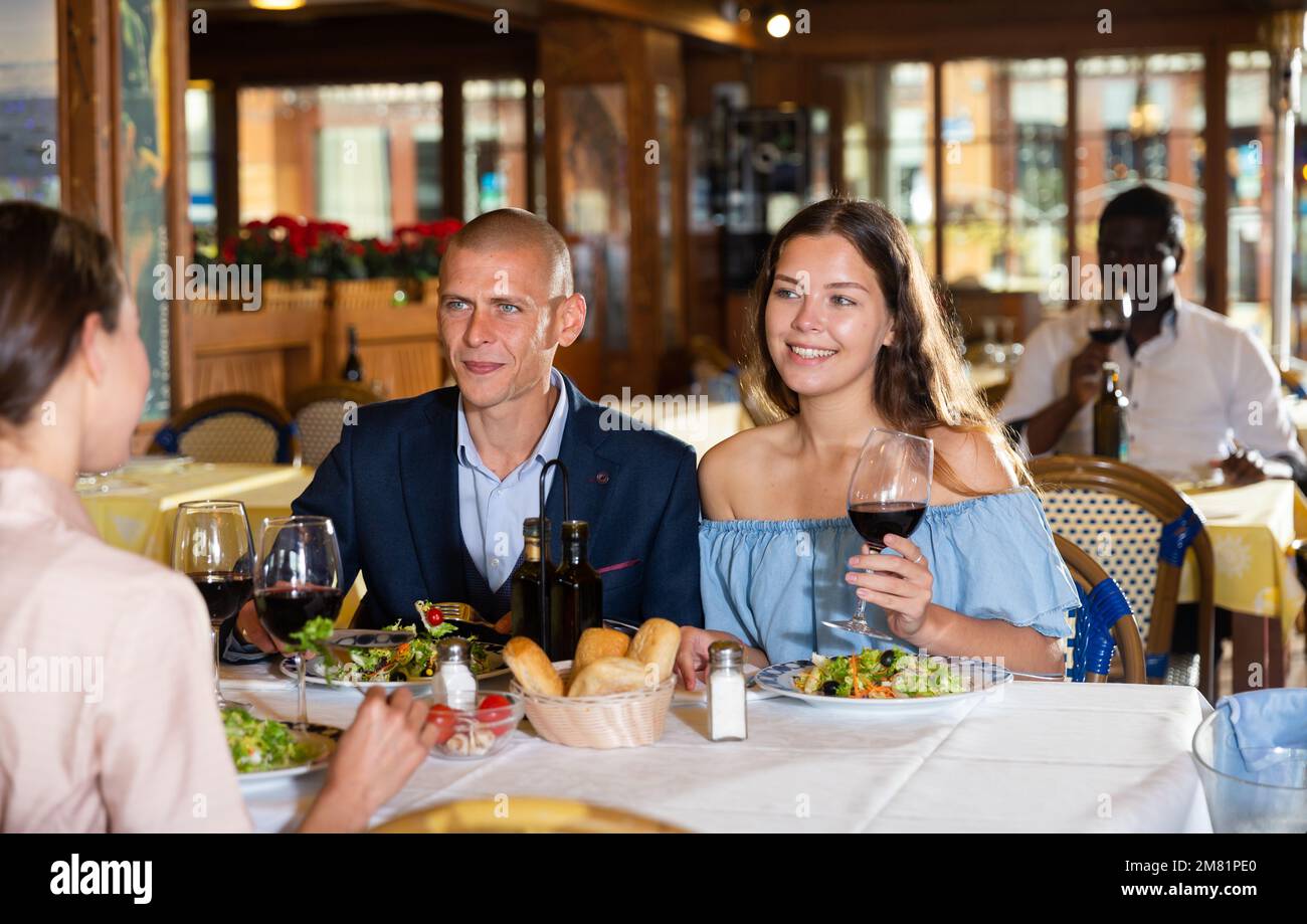 Two french people having conversation hi-res stock photography and ...