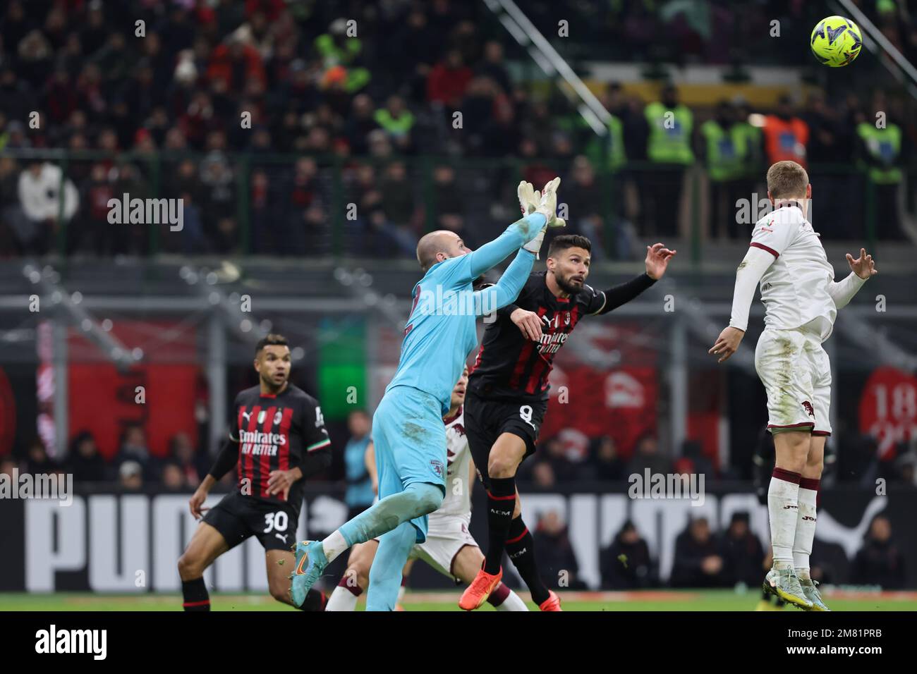 Olivier Giroud of AC Milan and Vanja Milinkovic-Savic of Torino FC in action during Coppa Italia ...