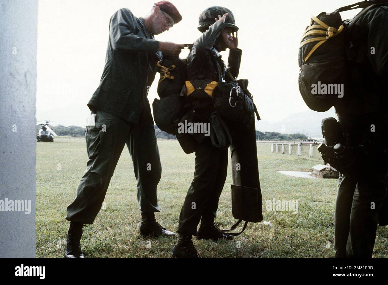 A Panama Defense Force soldier is checked by an instructor from the 2 ...