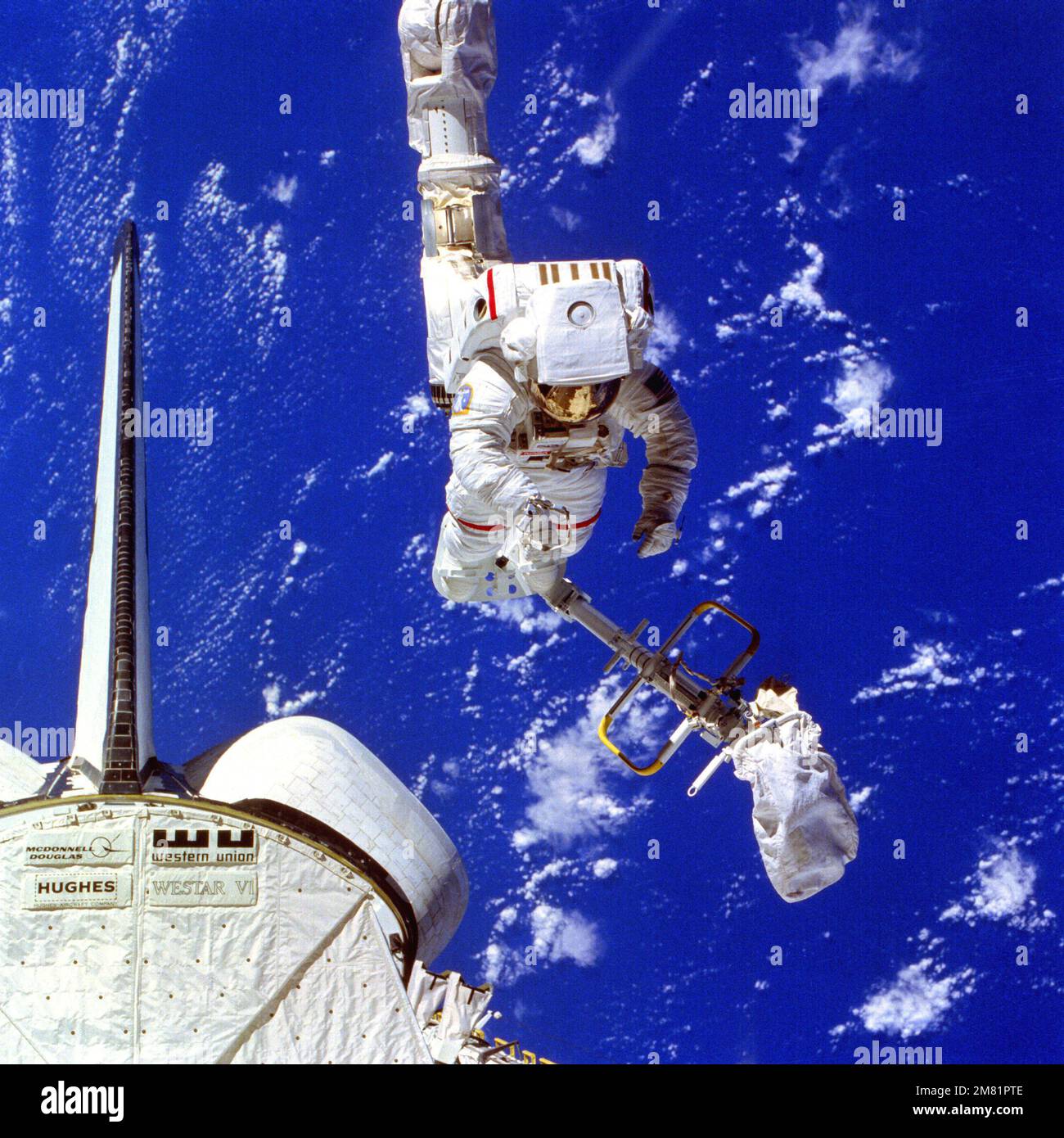 Astronaut Bruce McCandless II conducts an extravehicular activity (EVA ...