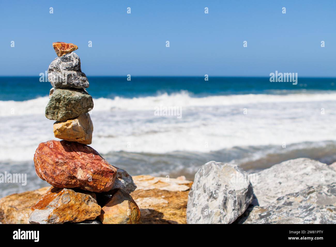 Stacked rocks at the beach Stock Photo - Alamy